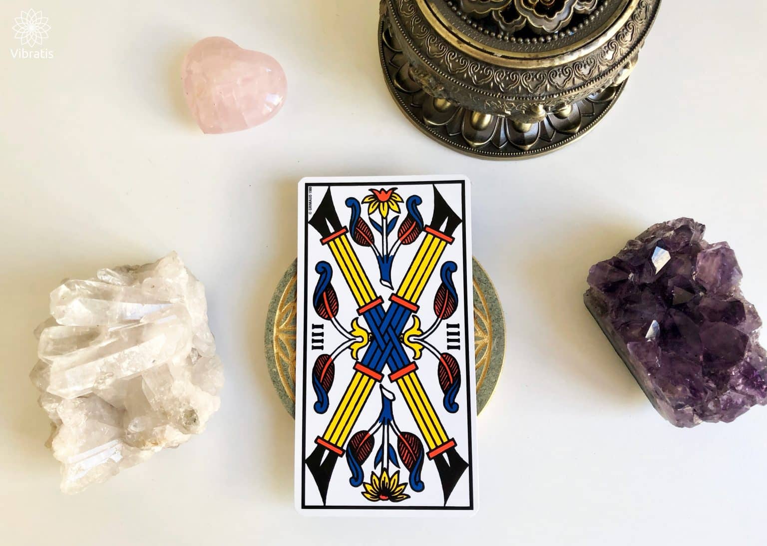 Significations du Quatre de Bâton dans le Tarot de Marseille
